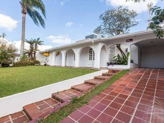 Casa com 3 dormitórios à venda, 320 m² por R$ 1.980.000 Curitiba