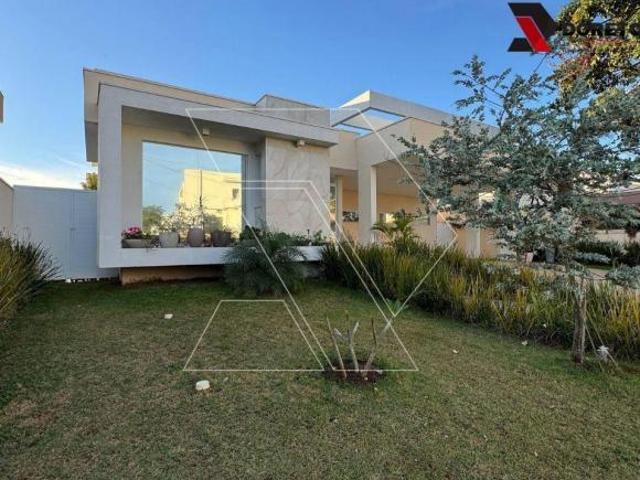 Casa com 3 dormitórios à venda, 323 m² por R$ 1.750.000 Condomínio Reserva Campos de Boituva Boi