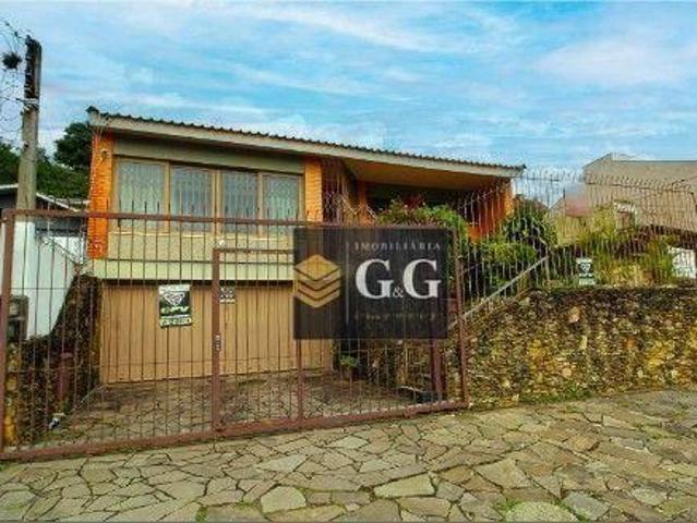 Casa com 3 dormitórios à venda, 336 m² por R$ 729.000,00 Santa Tereza Porto Alegre/RS