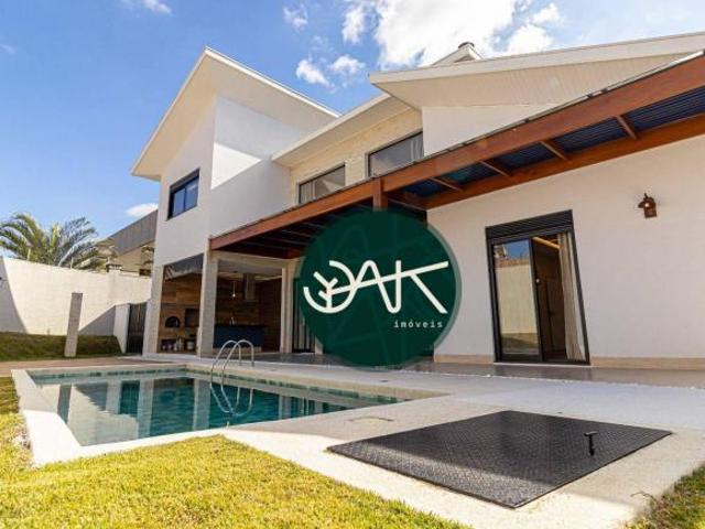 Casa com 3 dormitórios à venda, 337 m² por R$ 3.550.000,00 Condomínio Residencial Monte Carlo Sã