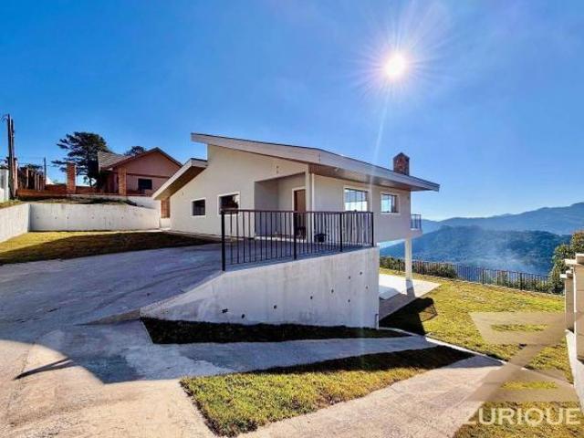 Casa com 3 dormitórios à venda, 330 m² por R$ 2.500.000,00 Jardim Imperial Campos do Jordão/SP