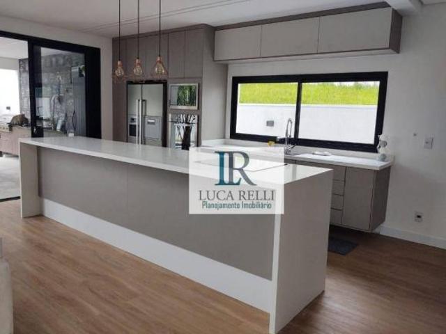 Casa com 3 dormitórios à venda, 330 m² por R$ 2.350.000,00 Condomínio New Ville Santana de Parna