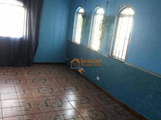 Casa com 3 dormitórios à venda, 377 m² por R$ 693.000,00 Taboão Guarulhos/SP