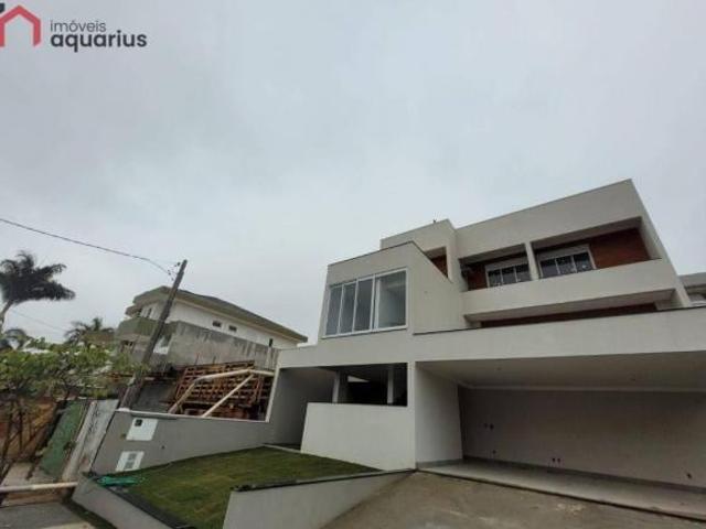Casa com 3 dormitórios à venda, 370 m² por R$ 3.080.000,00 Condomínio Residencial Jaguary São Jo
