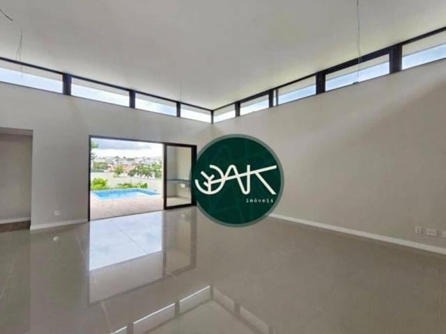 Casa com 3 dormitórios à venda, 385 m² por R$ 3.200.000,00 Condomínio Reserva do Paratehy São Jo