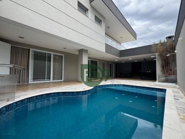 Casa com 3 dormitórios à venda, 380 m² por R$ 2.800.000,00 Jardim Portal da Colina Americana/SP