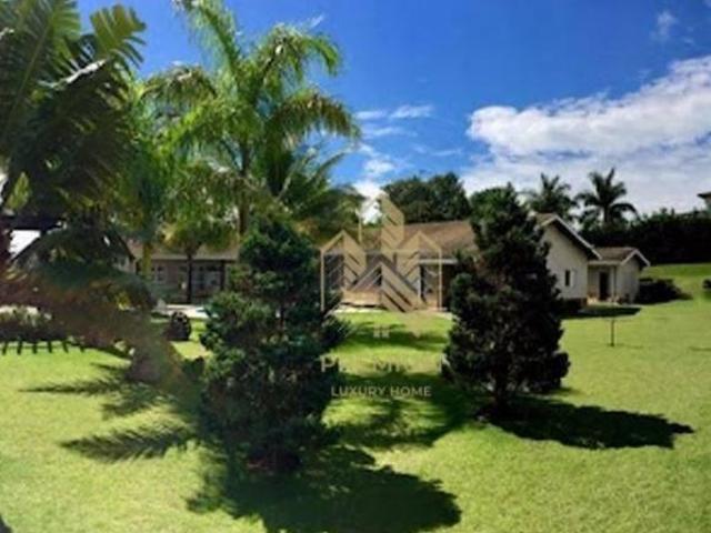 Casa com 3 dormitórios à venda, 420 m² por R$ 3.400.000,00 Condomínio Jardim das Palmeiras Braga