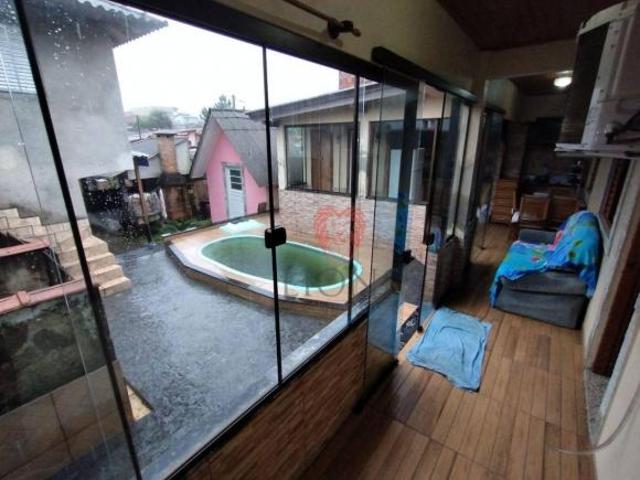 Casa com 3 dormitórios à venda, 43 m² por R$ 456.000,00 Vera Cruz Gravataí/RS
