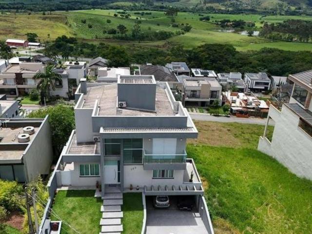 Casa com 3 dormitórios à venda, 443 m² por R$ 3.400.000 Condomínio Residencial Jaguary São José