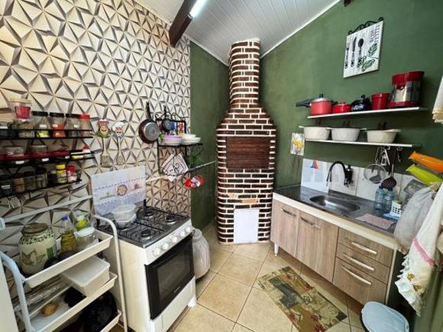 Casa com 3 dormitórios à venda, 71 m² por R$ 550.000,00 Jardim das Palmeiras Caraguatatuba/SP