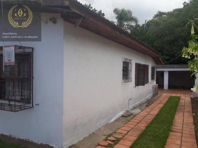 Casa com 3 dormitórios à venda, 72 m² por R$ 650.000 Centro Viamão/RS