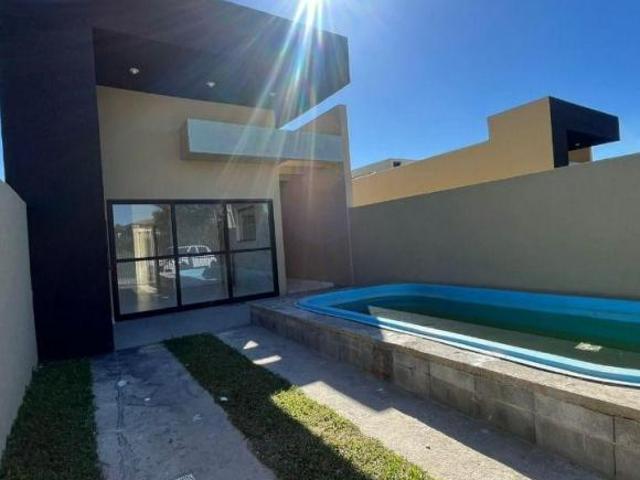 Casa com 3 dormitórios à venda, 80 m² por R$ 600.000,00 Cohapar Guaratuba/PR