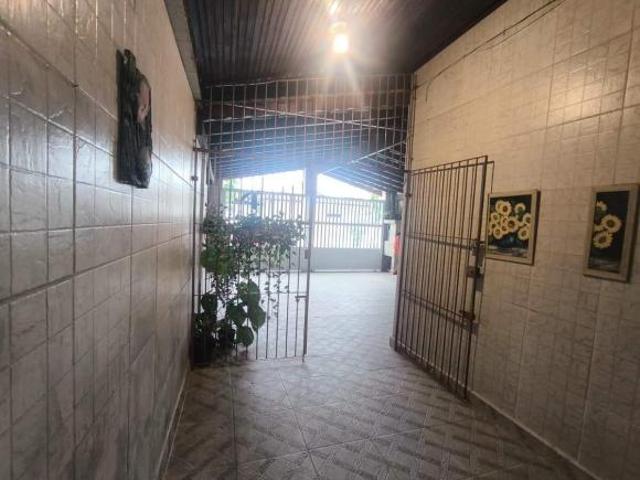 Casa com 3 dormitórios à venda, 80 m² por R$ 650.000,00 Caiçara Praia Grande/SP