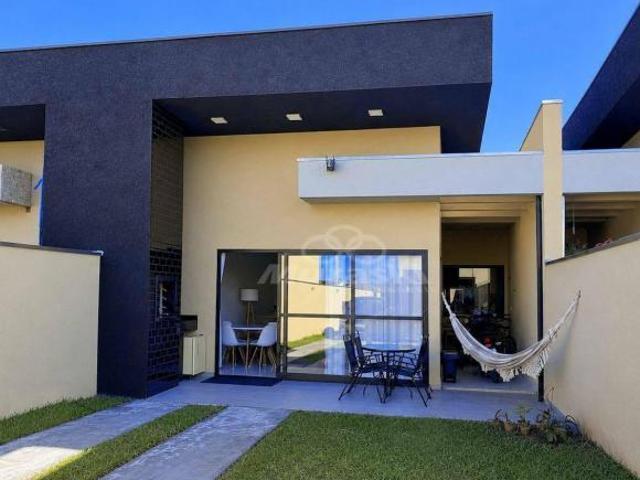 Casa com 3 dormitórios à venda, 80 m² por R$ 680.000,00 Cohapar Guaratuba/PR