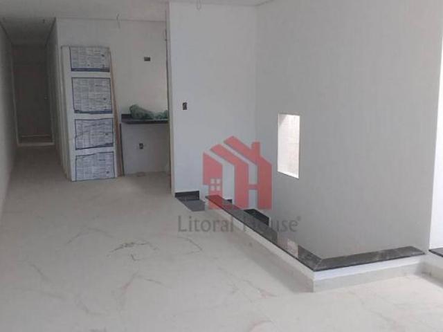 Casa com 3 dormitórios à venda, 87 m² por R$ 690.000,00 Aparecida Santos/SP