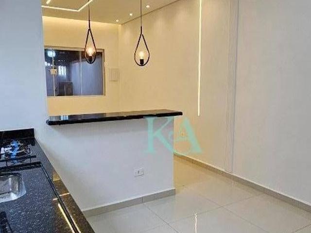 Casa com 3 dormitórios à venda, 88 m² por R$ 648.000,00 Vilamar Praia Grande/SP