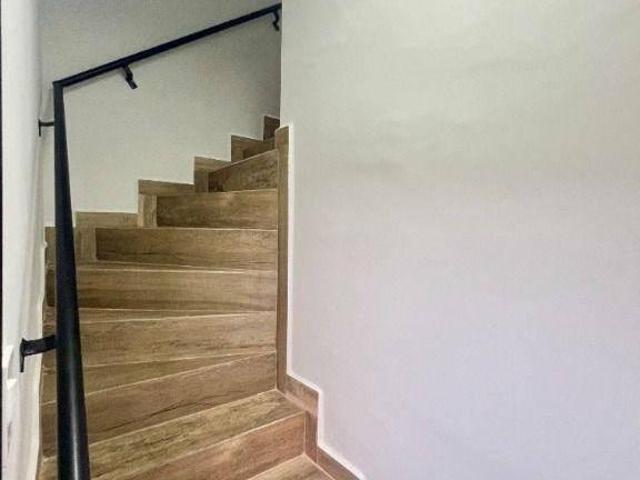 Casa com 3 dormitórios à venda, 90 m² por R$ 480.000,00 Tude Bastos Praia Grande/SP