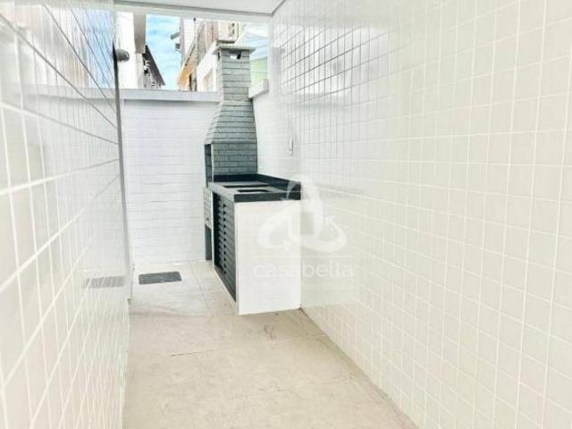 Casa com 3 dormitórios à venda, 90 m² por R$ 910.000,00 Ponta da Praia Santos/SP