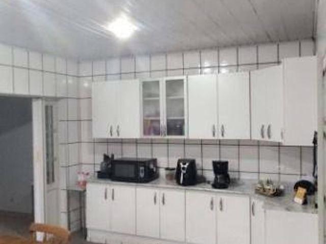 Casa com 3 dormitórios à venda por R$ 890.000,00 Ponta da Praia Santos/SP