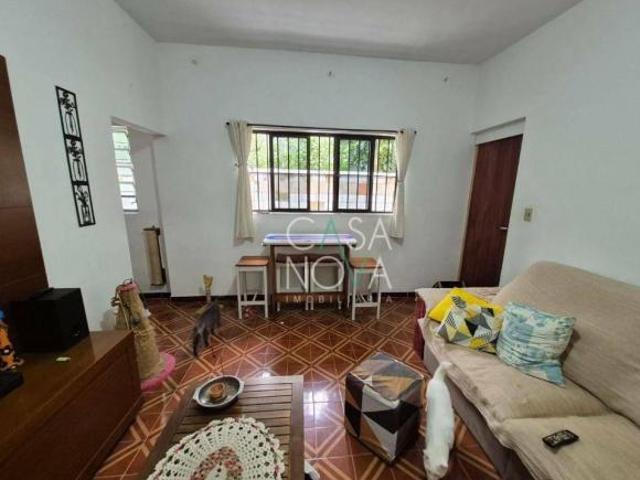 Casa com 3 dormitórios à venda por R$ 920.000,00 Estuário Santos/SP
