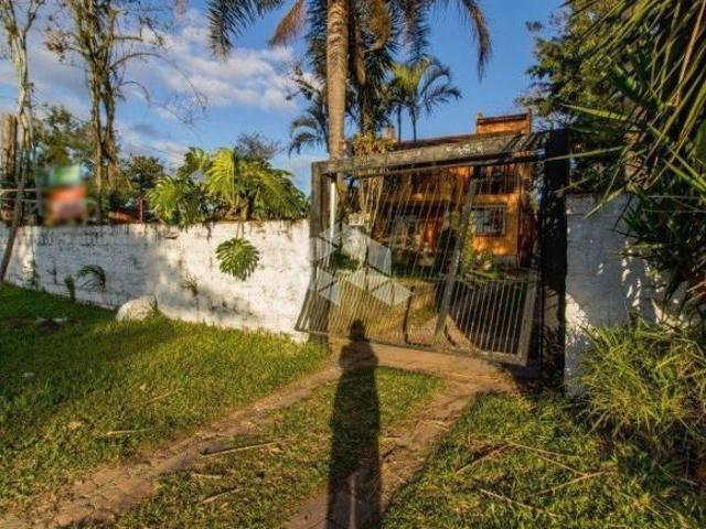Casa com 3 dormitórios e 3 banheiros, 318m² Zona Sul/ POA