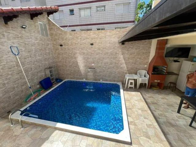 Casa com 3 dormitórios e piscina à venda, 125 m² por R$ 1.060.000 Caiçara Praia Grande/SP