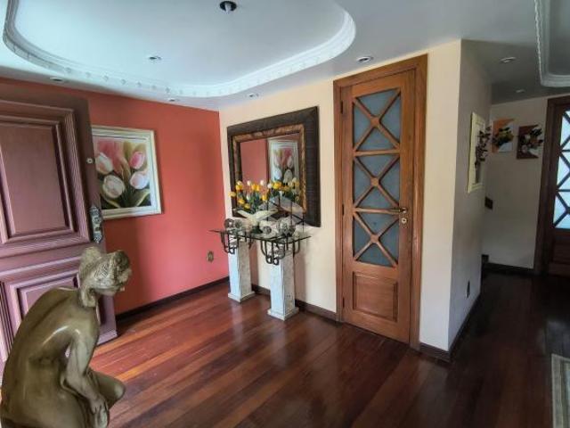 Casa com 3 dormitórios e piscina, bairro Ipanema em Porto Alegre