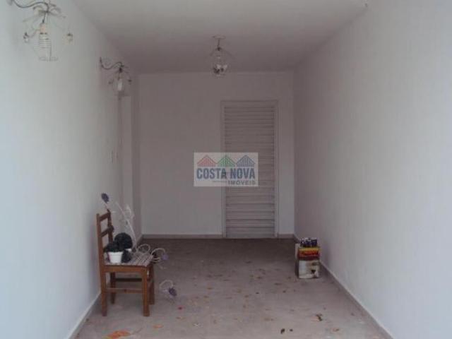 Casa com 3 Dormitórios e Quintal Amplo na Ponta da Praia, Santos