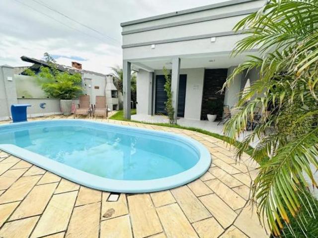 Casa com 3 dormitórios em Atlântida Sul