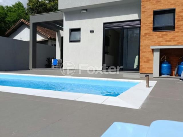 Casa com 3 dormitórios em Canoas