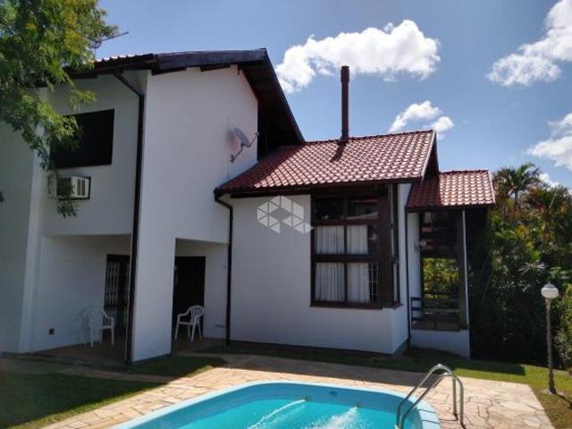 Casa com 3 dormitórios, suíte com hidromassagem e piscina Bairro Pinheiro, São