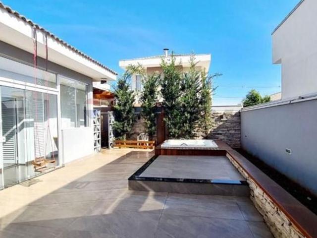 Casa com 3 dormitórios, sendo 3 suítes e com áerea Gourmet integrada no Condomínio Reserva Real Pa