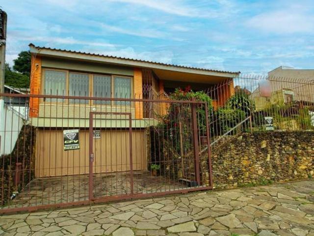 Casa com 3 dormitórios, 276 m² Santa Tereza Porto Alegre/RS
