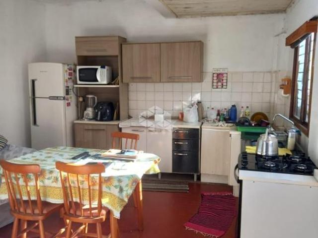 Casa com 3 dormitórios, 2 vagas cobertas e mais anexo, em terreno de 327,25 m²