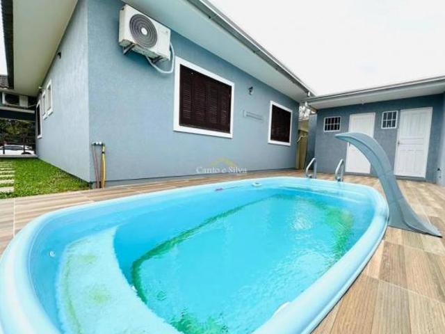 Casa com 3 dorms suíte, próxima ao centro em Atlântida Sul