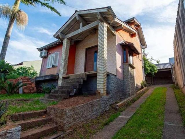 Casa com 3 quartos à venda em Gravataí, no bairro Cadiz