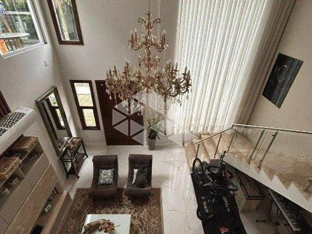 Casa com 3 quartos e 343m² à venda em Jardim Botânico, Porto Alegre