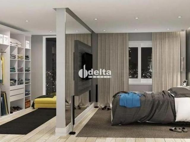 Casa com 3 quartos, sendo 1 suíte, disponível para venda no bairro Novo Mundo, em Uberlândia?MG