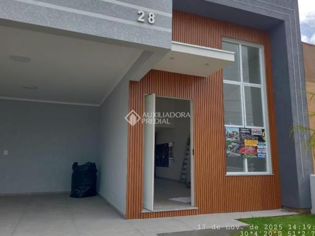 Casa com 3 quatros a venda na cidade de Viamão com 104m²