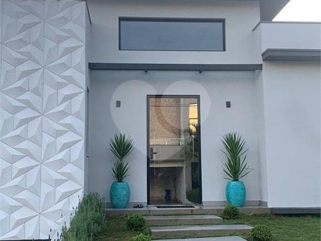 Casa com 3 suítes à venda em Indaiatuba, Condomínio Terra Magna, com 298 m²