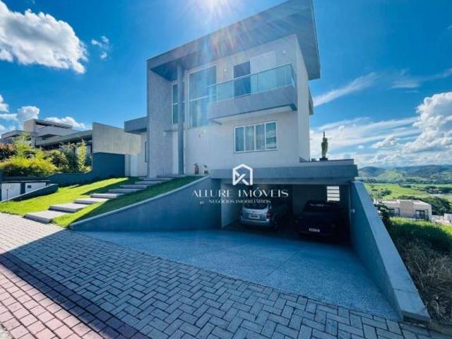 Casa com 3 suítes à venda, 443 m² por R$ 3.300.000,00 Condomínio Residencial Jaguary São José do