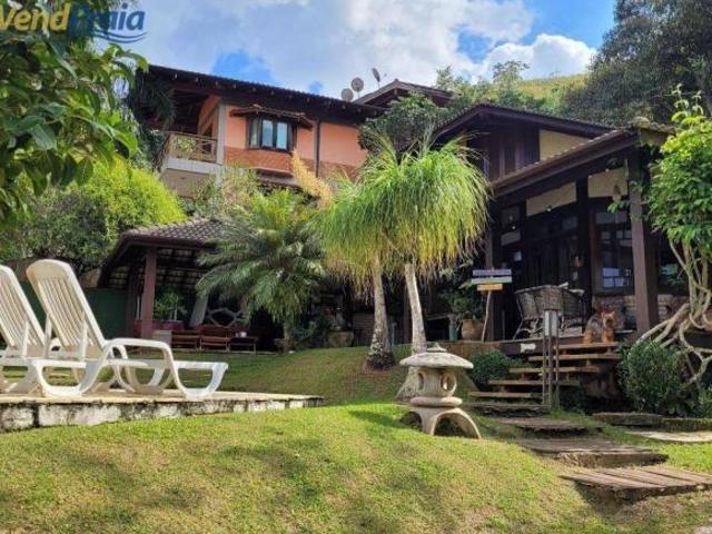 Casa com 3 dormitórios à venda, 400 m² por R$ 3.000.000,00 Reserva Du Moulin São Sebastião/SP
