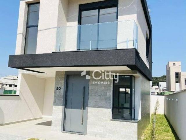 Casa com 3 suítes e vista para área verde em condomínio fechado no Santa Cândida por R$ 1.240.000