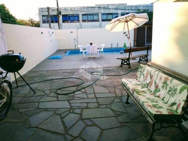 Casa com 3 suítes no bairro Cavalhada