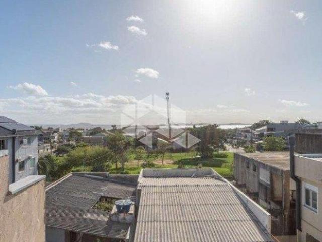 Casa com 3 suítes no bairro Guarujá, Porto Alegre
