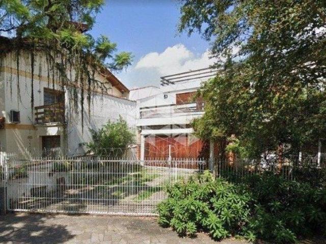 Casa com terraço mais 05 dormitórios c/ suíte e garagem múltipla em terreno 717,21m2 Higienópolis