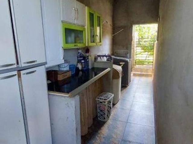Casa com terreno de 1.000m², sendo 2 dormitórios, 2 banheiros, cozinha e área gourmet e galpão Ja