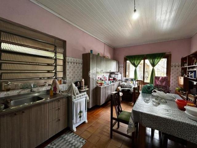 CASA COM TERRENO DE 1.100M²