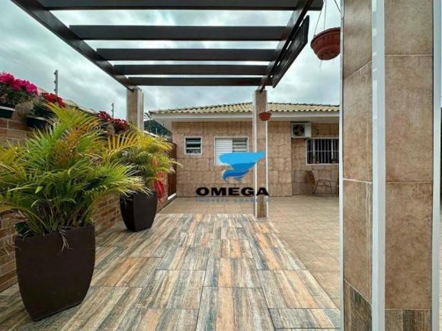 Casa com terreno de 480 metros à venda na Praia do Guaiuba no Guarujá | Omega Imóveis