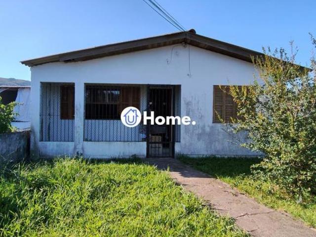 Casa com Terreno Grande com ótima Localização